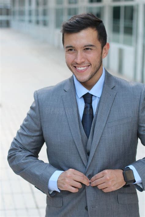 Classically Good Looking Male Buttoning Up His Tailored Suit Stock