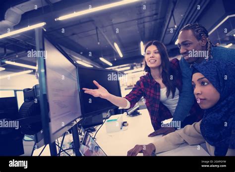 Young Multiethnics Business Team Of Software Developers Working Together Using Laptop Computer