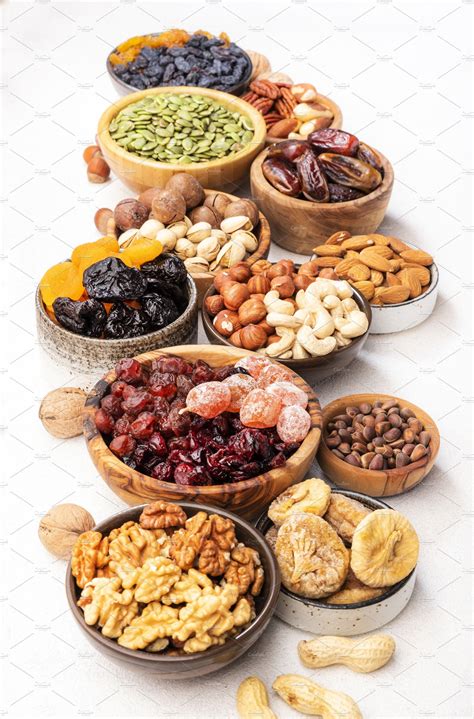 Assorted Dried Fruits And Nuts In Bowls Set