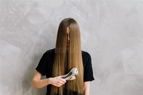 Beautiful Lady Doing Her Make Up And Hair In Bedroom Attractive Young Female With Pretty Long