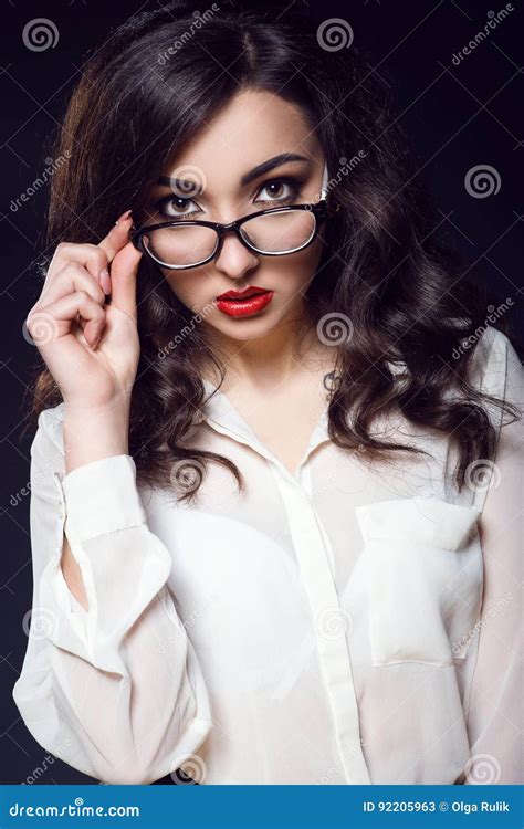 Beautiful Young Business Woman With Dark Wavy Hair And Red Lips Wearing