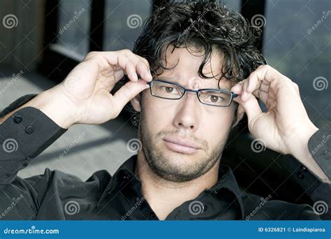 Man Fixing His Glasses Stock Image 6326821