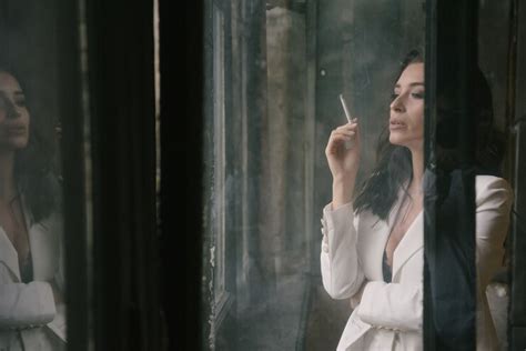 Premium Photo Young Sexy Brunette Woman In Suit Smoking A Cigarette