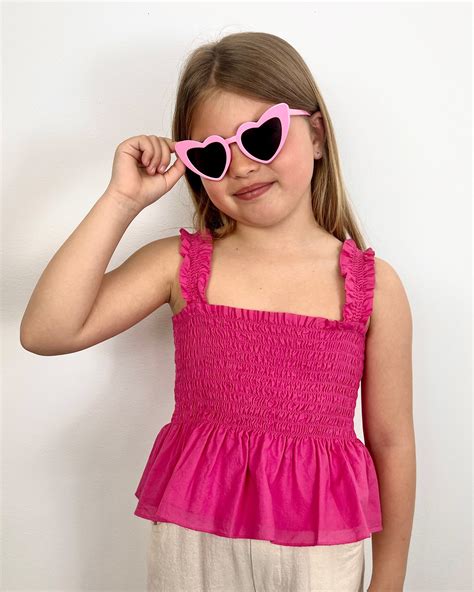 Mini Mignon Paris Our Pretty Model In Her Mini Mignon Pink Top Find Your Perfect Top Online