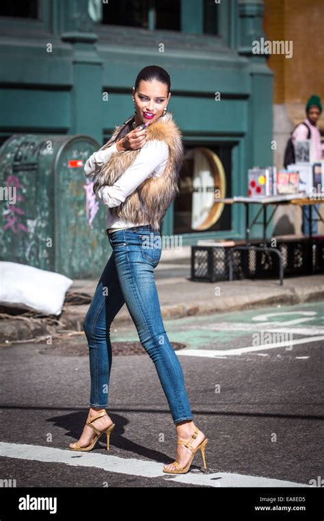 Adriana Lima Poses As She Models On A Photo Shoot For Maybelline In
