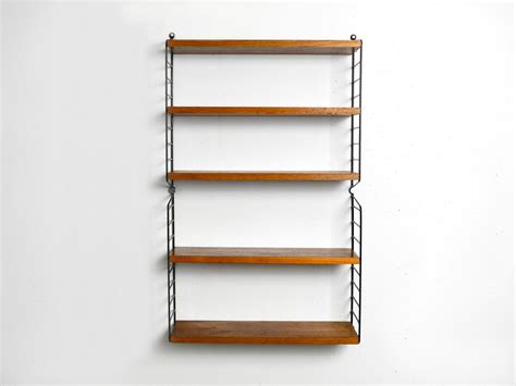 Original 1960s Narrow Teak Nisse Strinning Wall Hanging Shelf With