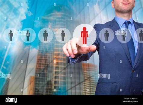 Businessman pressing button on virtual screens. Business, technology, internet, networking and ...