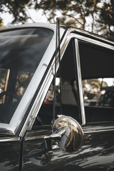 Door Of A Classic Car Emphasizing The Open Windshield Glass Elegant