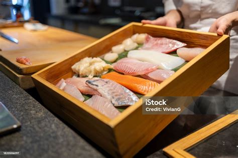 Chef Showing Fresh Sashimi In Japanese Omakase In The Restaurant Stock