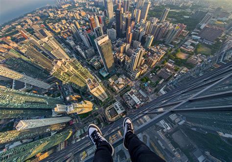 Person Looking Down From A Building