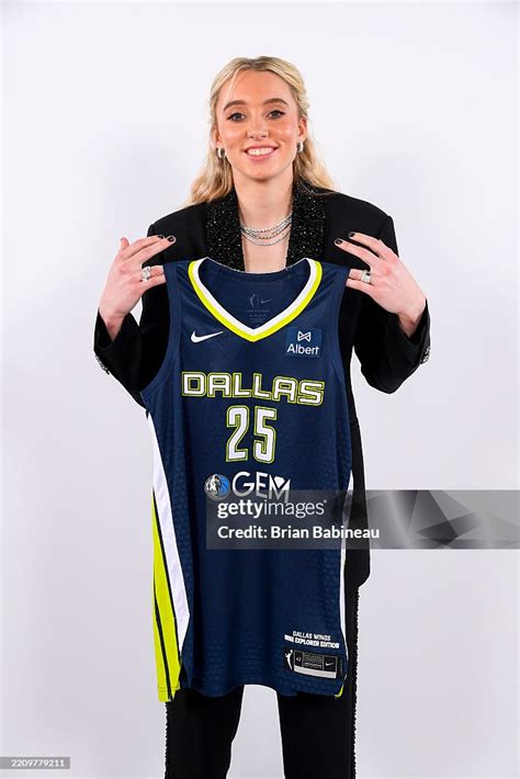 Paige Bueckers Poses For A Portrait After Being Drafted By The Dallas