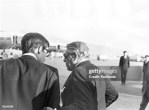 Greek Shipping Magnate Aristotle Onassis Chats With His Son Alexander