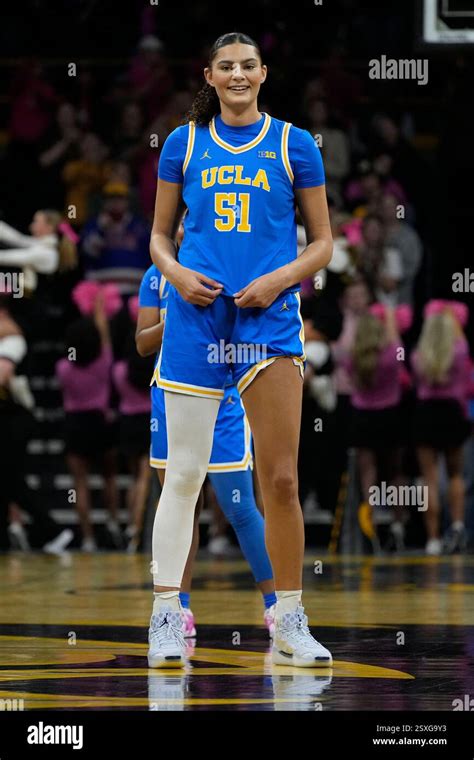 Ucla Center Lauren Betts Stands On The Court Before An Ncaa College