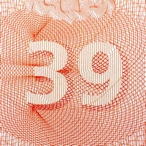 Close Up Of Intricate Orange Number 39 Design On White Background