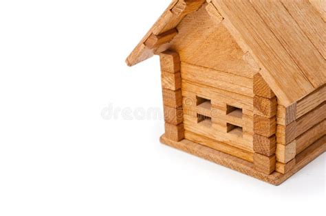 Small Wooden Toy House Background For The Construction Of Housing From