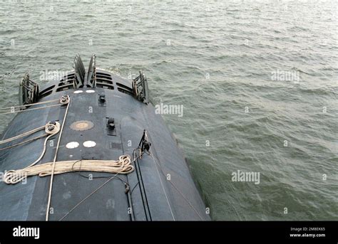 The Hatches Of The 12 Vertical Launch Tomahawk Missile Tubes Stand Open