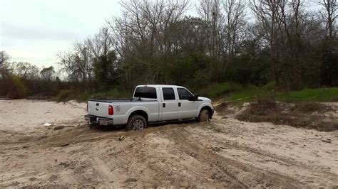 Chevy Pulls Out Ford F250 Buried In Sand Youtube