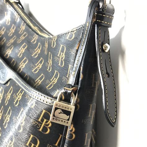 Dooney And Bourke 1975 Signature Collins Black Depop