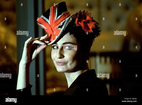 Model Erin Oconnor Models A Brightly Coloured Couture Hat At The Victoria And Albert Museum In