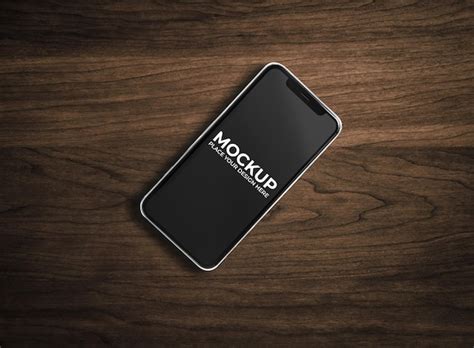 Premium PSD PSD Full Screen Smartphone Mockup Design Mobile On Wooden Background
