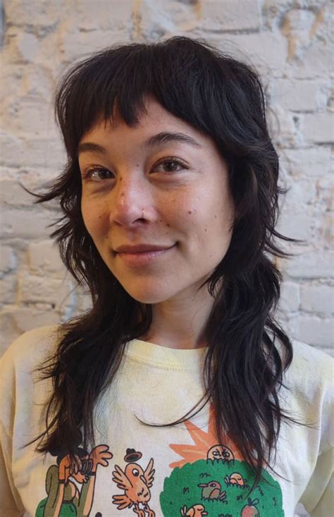 40 Fierce And Fabulous Wolf Haircut Ideas Layered Shag With Micro Bangs