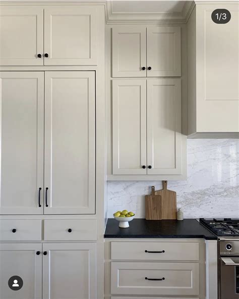 Taupe Kitchen Cabinets With Black Countertops