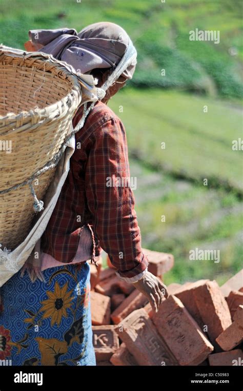 A Nepali Woman Working In A Bricks Factory In The Kathmandu Valley