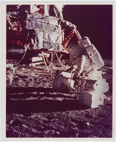 Apollo 12 Alan Bean Transporting Lunar Experiments To Ocean Of Storms