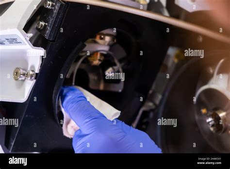 Cleaning Of Ion Source Of Mass Spectrometer By Laboratory Worker In