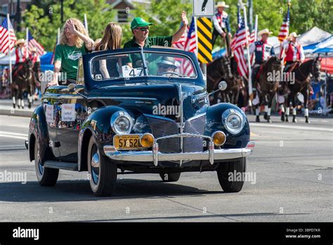 Provo Utah July 4 2025 People Ride And Wave From A Vintage