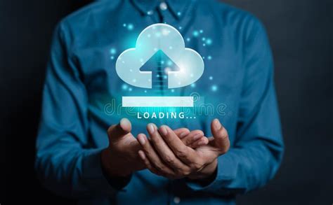 Businessman Holding Virtual Glowing Cloud Computing To Download And