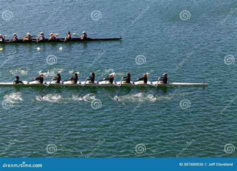 Two Women Crew Rowing Teams On Lake In California Editorial Photo