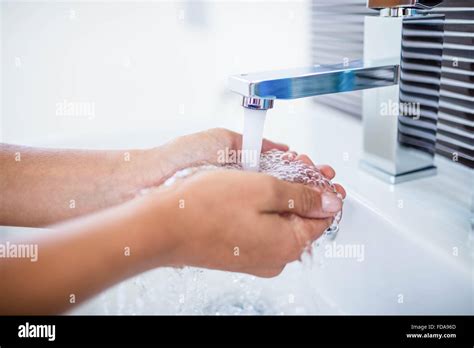 Woman Washing Her Hands Stock Photo Alamy