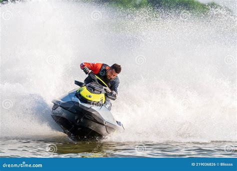 Brp Sea Doo Jet Ski Watercraft Driver In Action Making Turn And