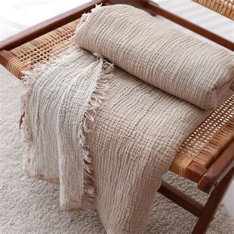 whether its traveling or home this 4 layer muslin gauze blanket will