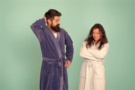 Premium Photo Sleepy People Blue Background Couple In Love Bathrobes