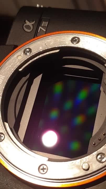 does this look like a scratch on the sensor r askphotography