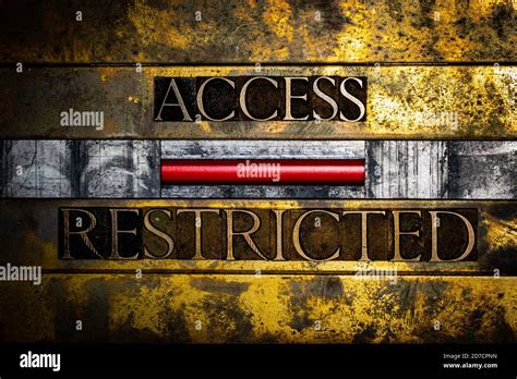 Access Restricted Text Message With Red Warning Sign On Vintage Textured Grunge Copper And Gold
