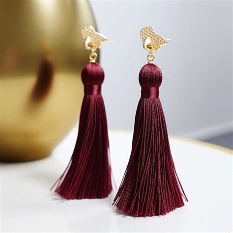 Premium Photo Decorative Tassels Of Different Colors And Inidian Mala Tasbih Or Islamic Prayer