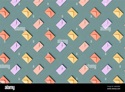 Three Dimensional Pattern Of Rows Of Pastel Colored Envelopes Flat Laid