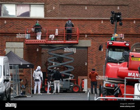 Set Dressers Prepare The Set For What Is Believed To Be The Film Set Of