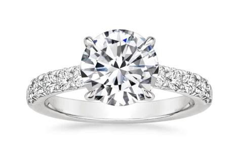 In A Pavé Diamond Ring Setting Small Diamonds Lined Across The Band