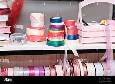 T Wrapping Ribbons On A Counter In A Flower Shop Various Colors Of