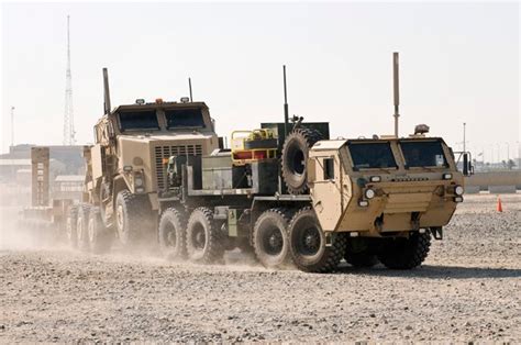 Military Vehicles Spotlight M984 Wrecker Towing Heavy Equipment