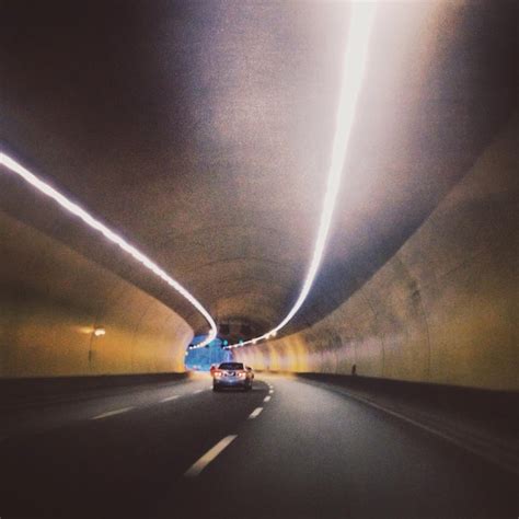 premium photo road passing through tunnel