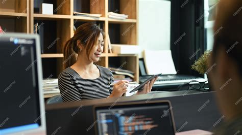 Premium Photo Young Software Developers Team Brainstorming And Working Together For Developing