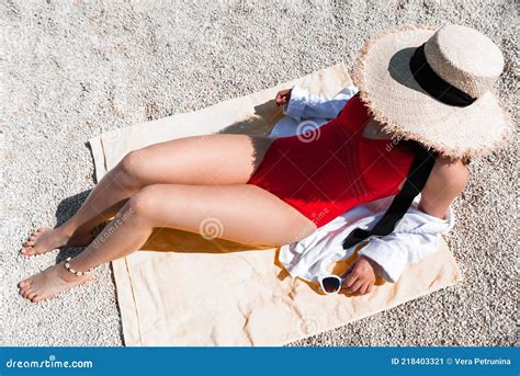 Young Woman In Red Swimsuit Sunbathing At Sea Beach Stock Image Image