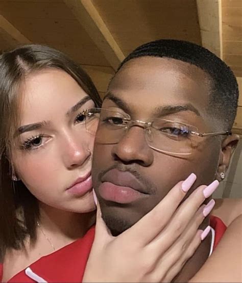 Interracial Couple Posing With Love And Affection