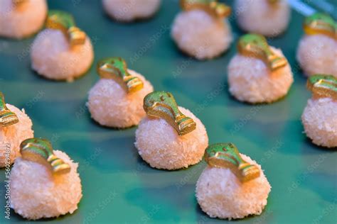 Foto De Coconut Candy Decorated With Golden Trophy Candy Store Condensed Milk Candy Balls