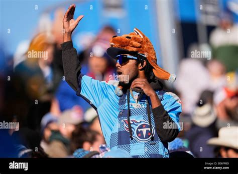 A Tennessee Titans Fans Cheers During The Second Half Of An Nfl